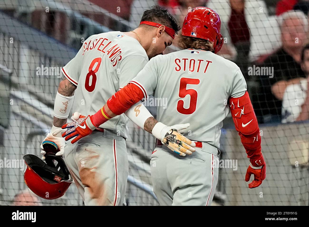 Philadelphia Phillies' Nick Castellanos (8) celebrates scoring a run ...