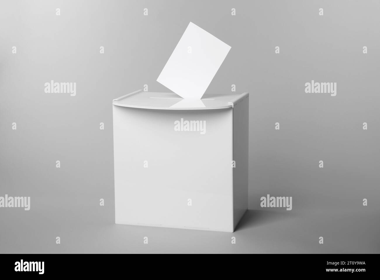 Ballot box with vote on light grey background. Election time Stock ...