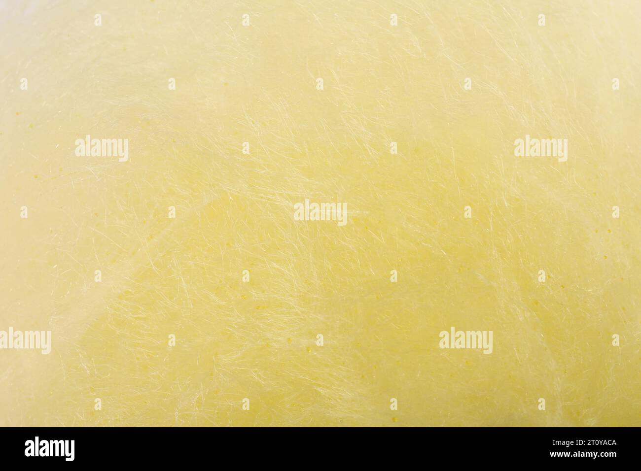 Texture of sweet yellow cotton candy as background, closeup Stock Photo ...