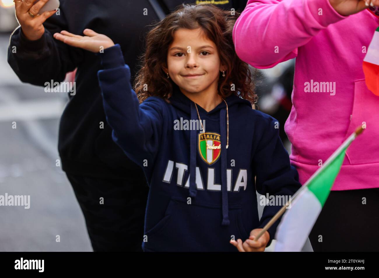 A youngster marches up 5th Avenue in the Columbus Day Parade in New ...