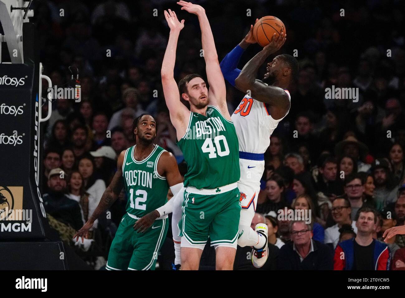 New York Knicks' Julius Randle (30) shoots over Boston Celtics' Luke ...