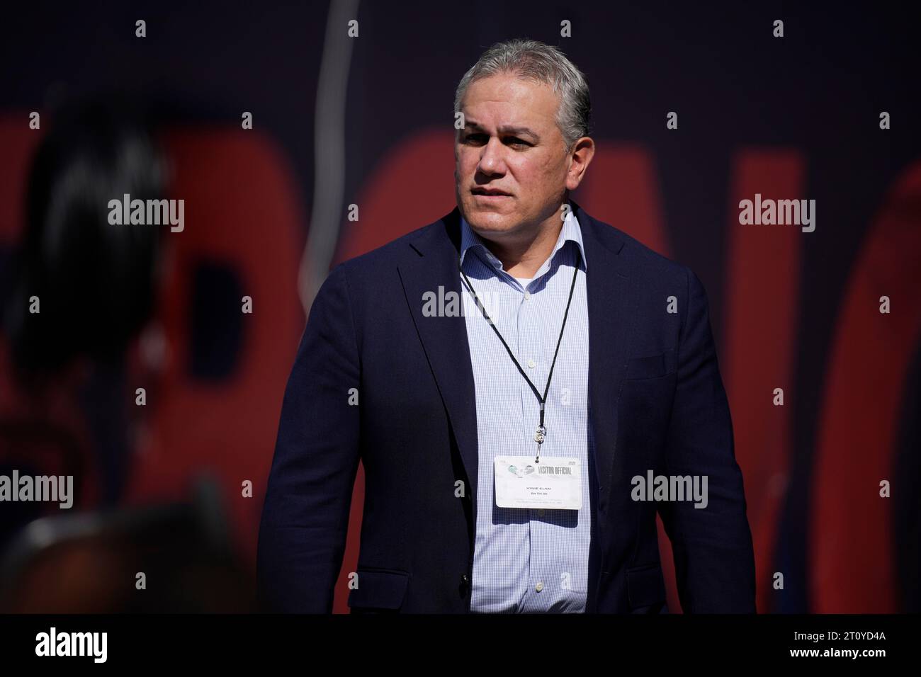New York Jets president Hymie Elhai looks on as players warm up before ...