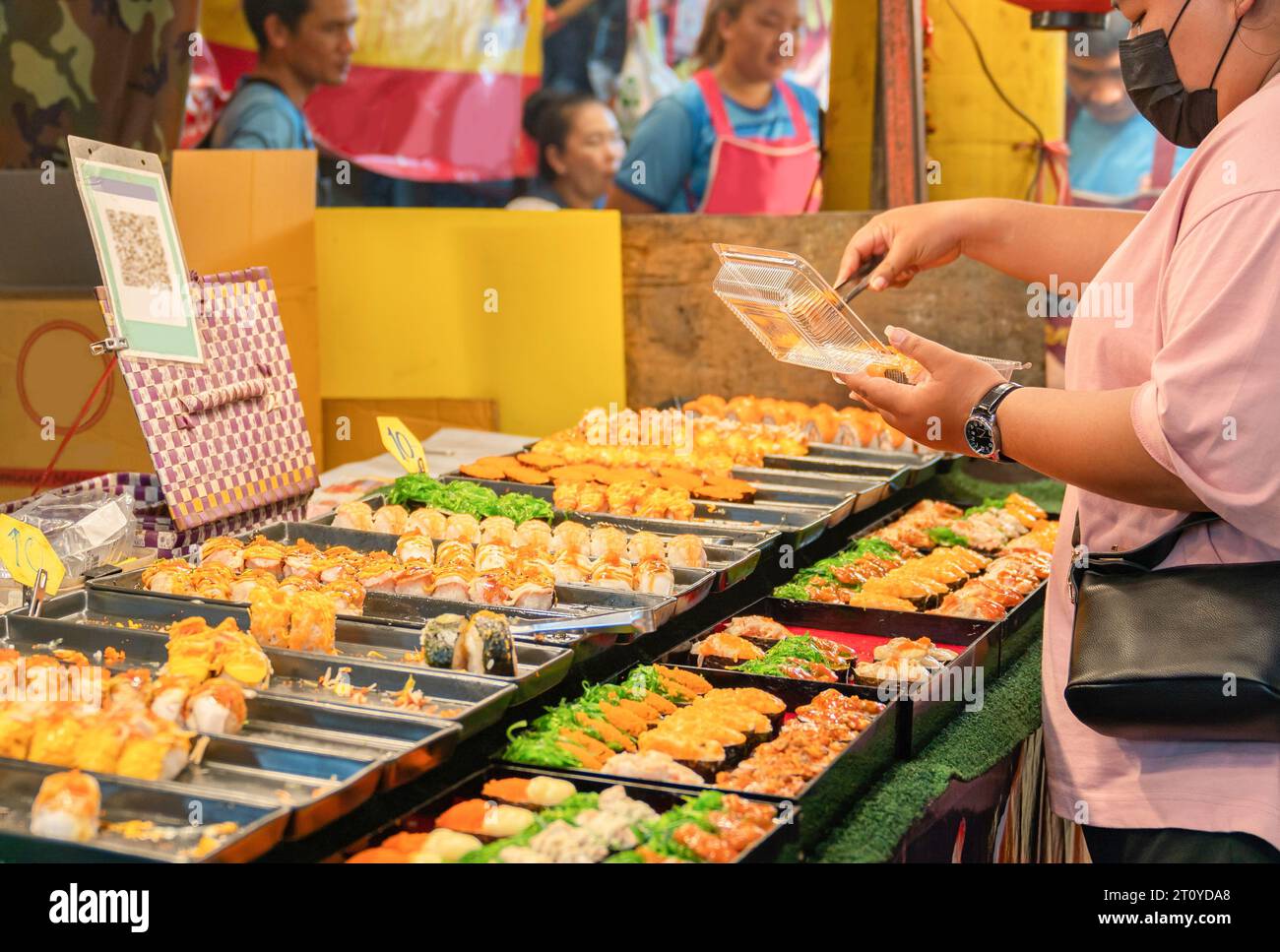 Custom pick a japanese sushi food. in street food market. Maki ands ...