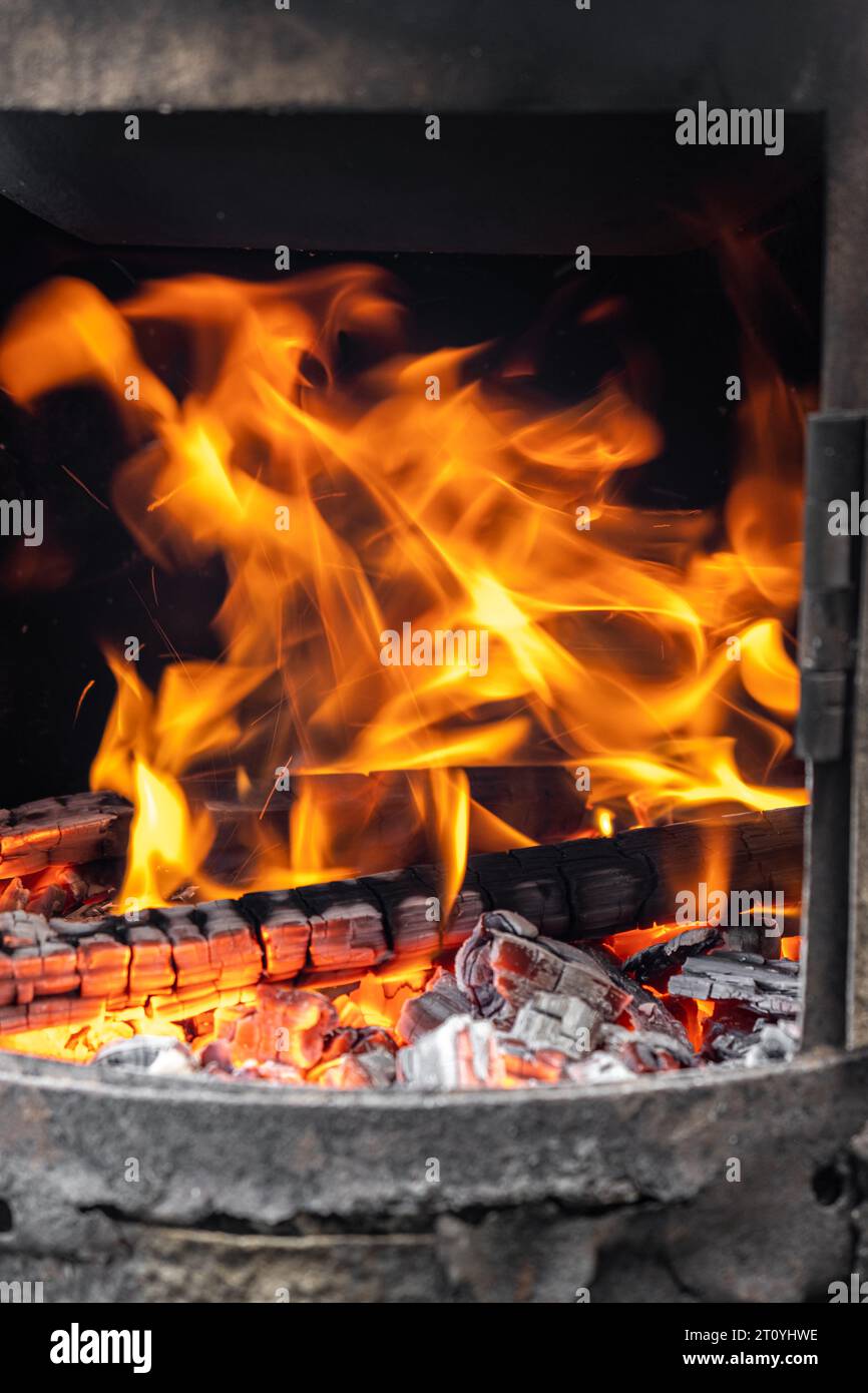 Burning coals in a metal grill for frying meat and vegetables Stock ...