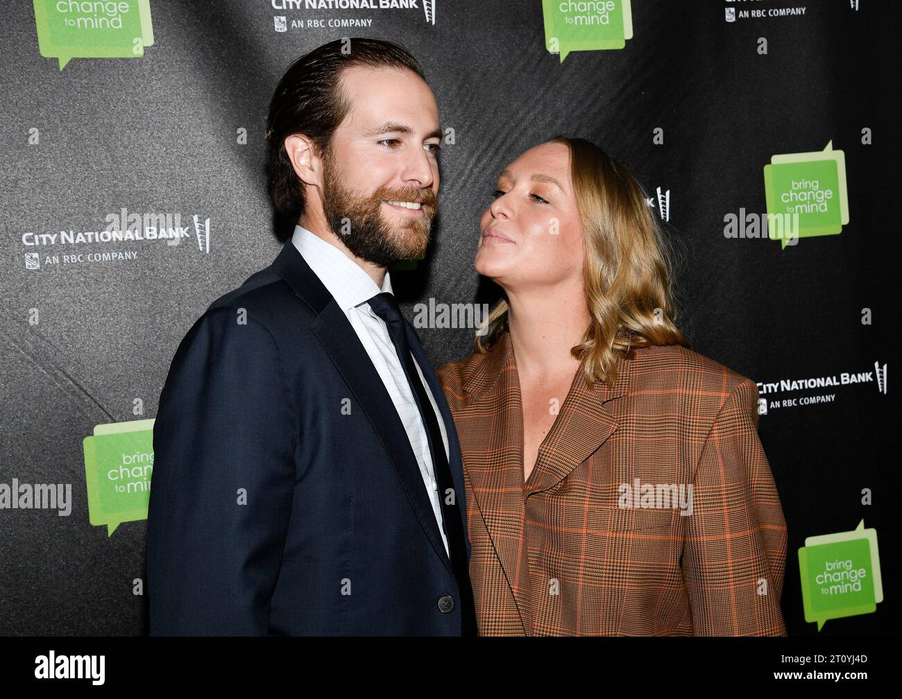 Annie Starke, right, and husband Marc Albu attend the Bring Change to ...