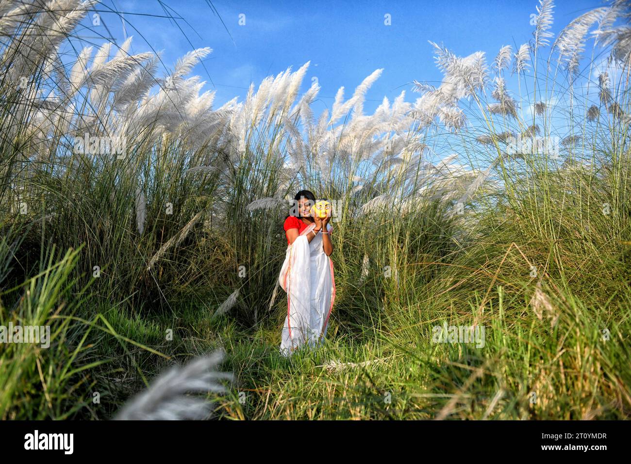 Fashion model, Rima Bhattacharya poses while wearing a traditional ...