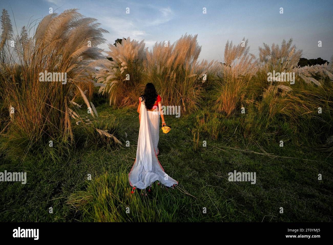 Fashion model, Rima Bhattacharya poses while wearing a traditional ...