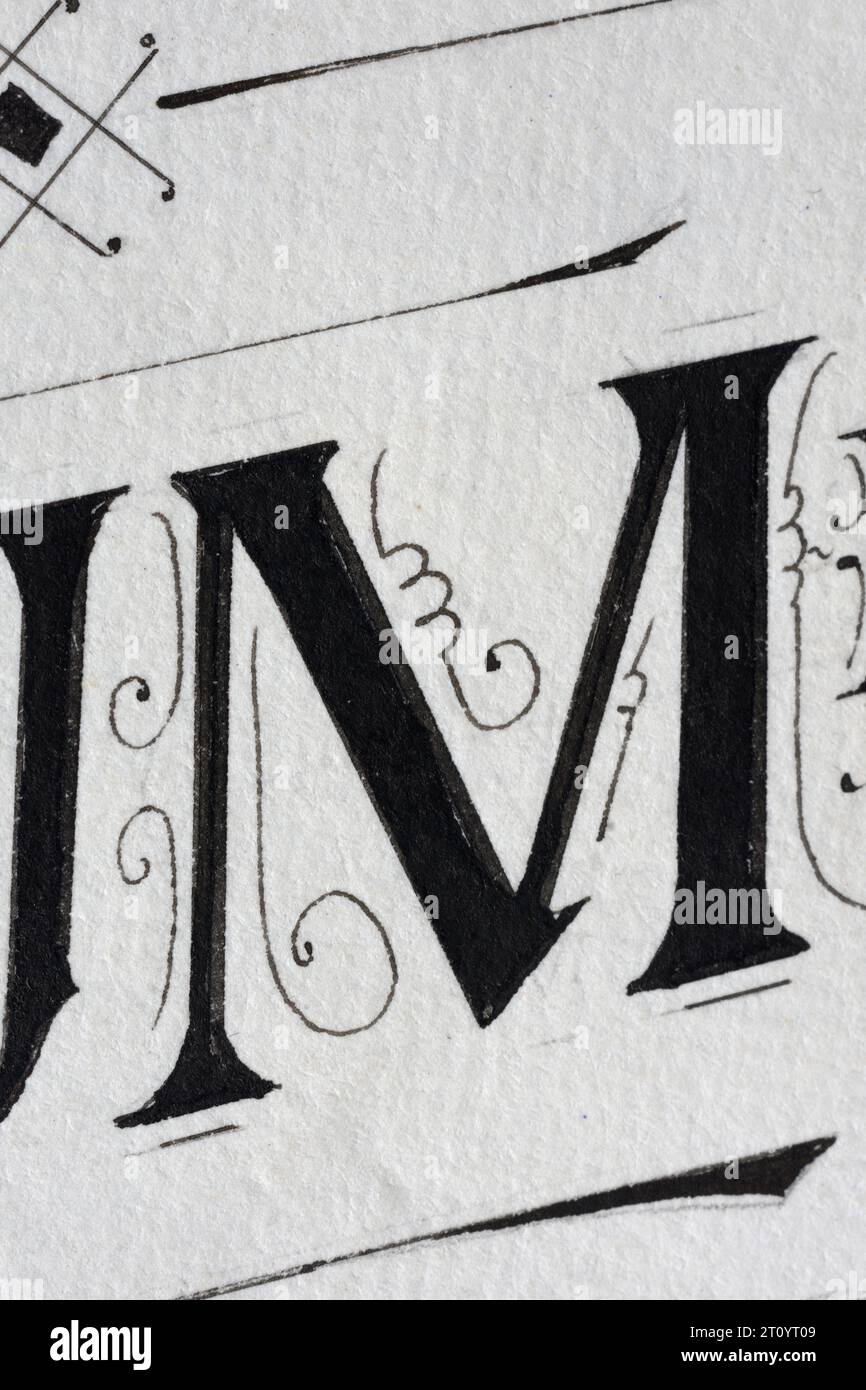 the letter M made with nib on white paper Stock Photo - Alamy