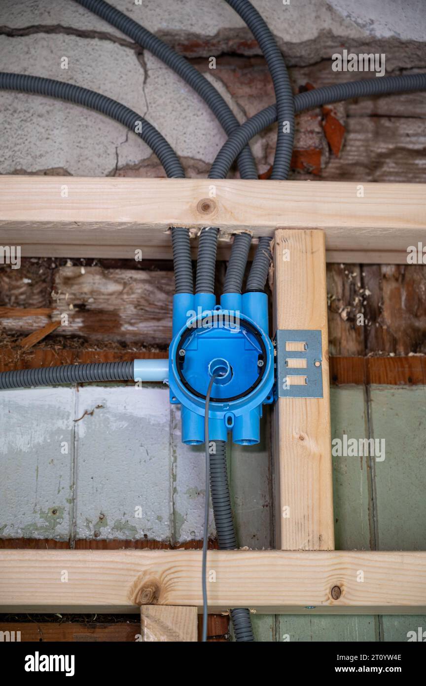 Preparing for installation of electricity in new build room Stock Photo ...