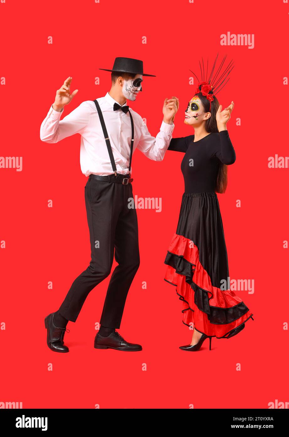 Young couple dressed for Mexico's Day of the Dead (El Dia de Muertos ...