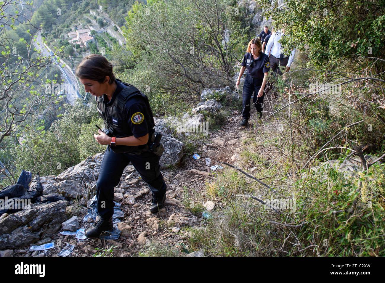 Menton, France. 09th Oct, 2023. Border police inspect the path created ...