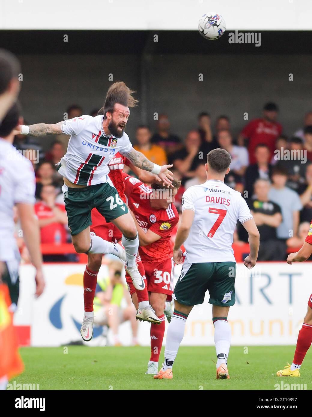 Steven Fletcher od Wrexham gets up to win a header during the Sky Bet ...