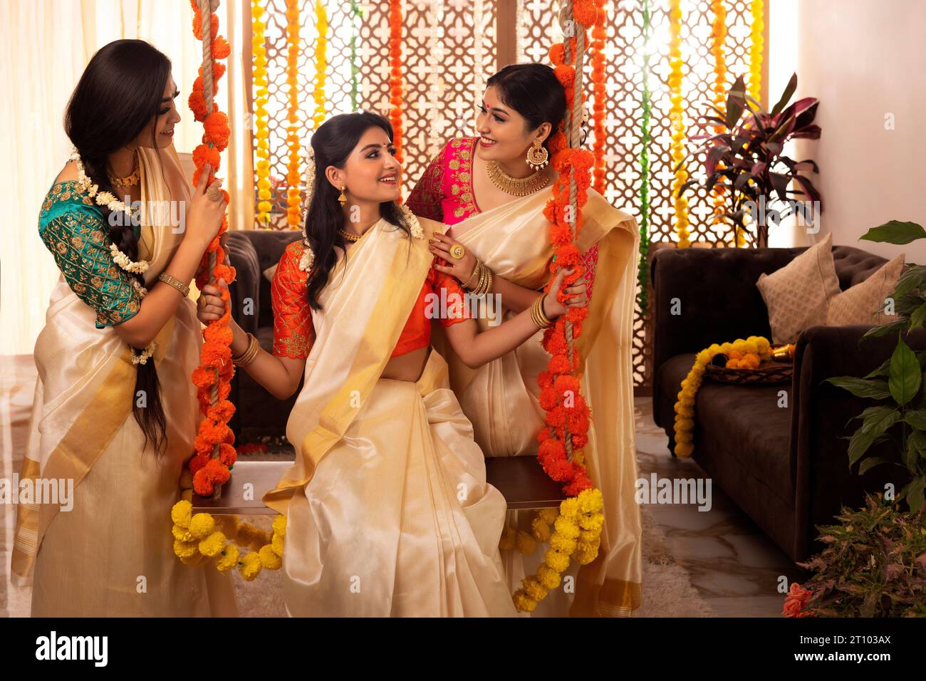 South Indian women celebrating Onam together at home Stock Photo - Alamy