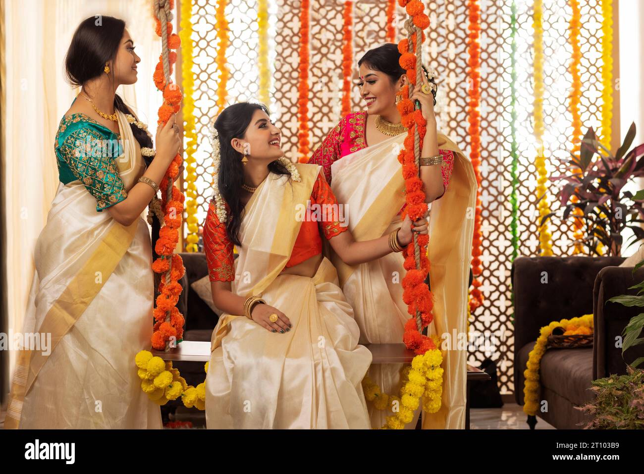 South Indian women celebrating Onam together at home Stock Photo - Alamy