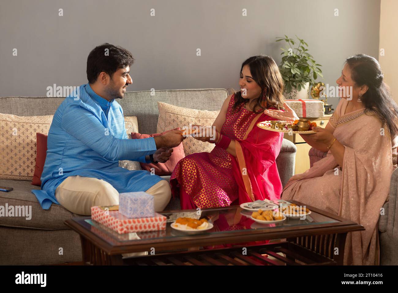 Indian family celebrating raksha bandhan hi-res stock photography and ...