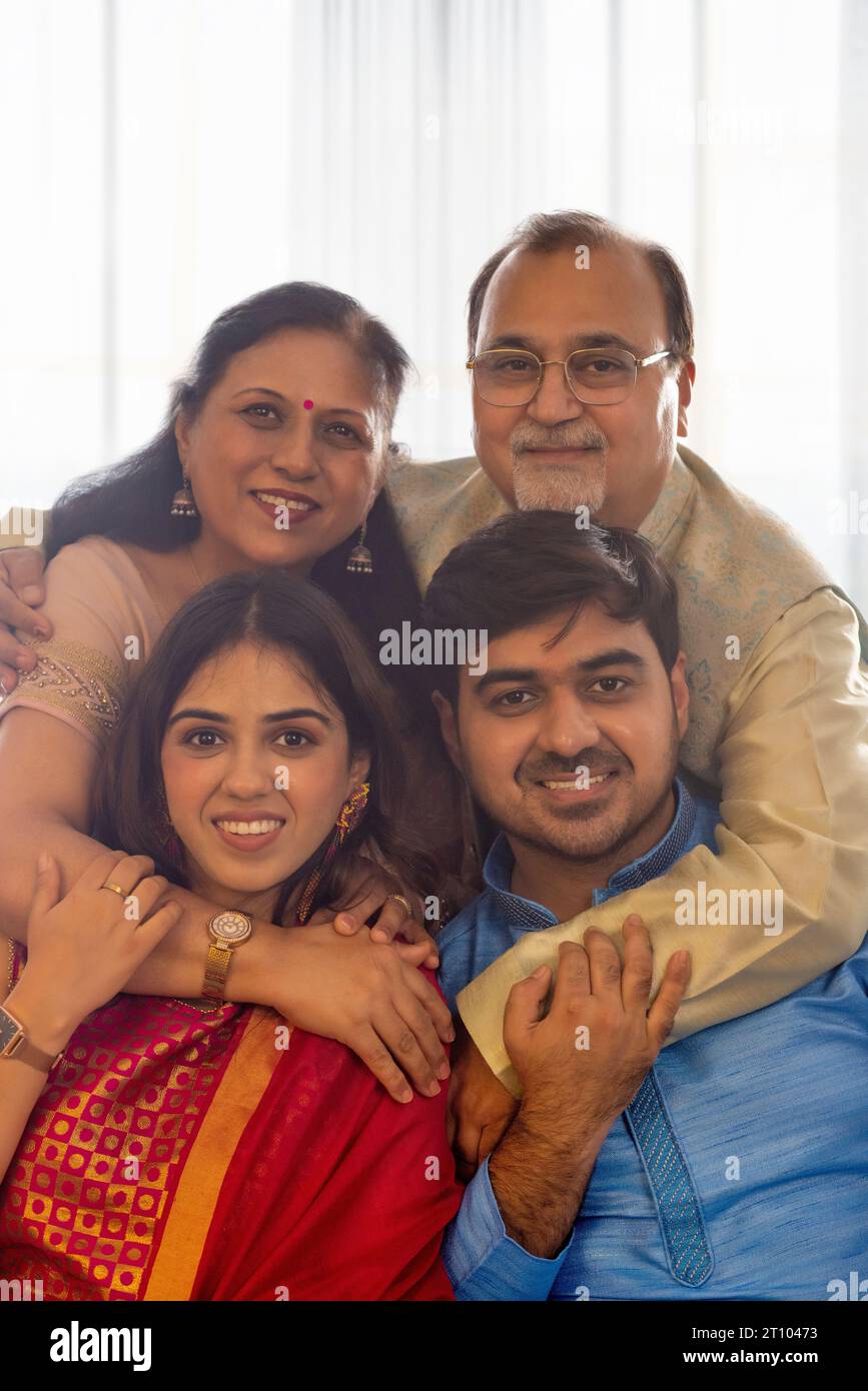 Portrait of happy Indian family together at home Stock Photo - Alamy