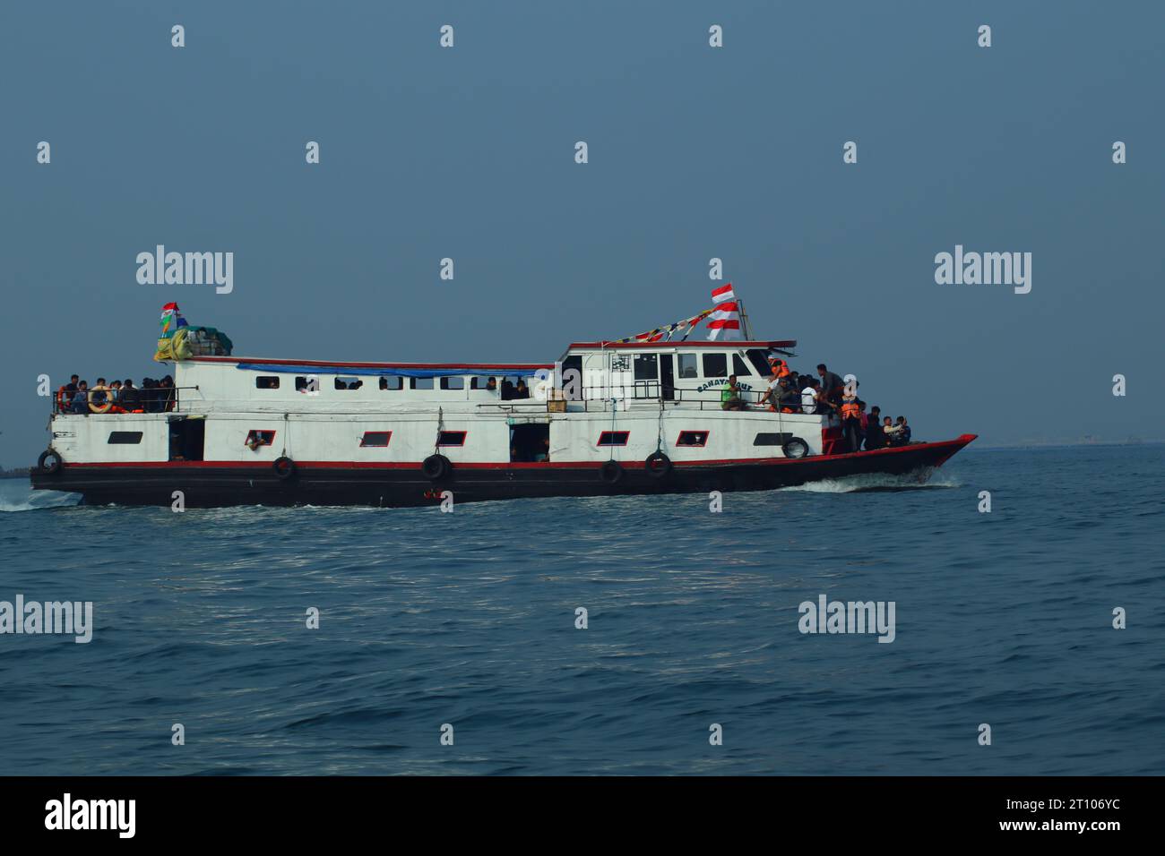 passenger ships and fishing boats, equally visible above the vast ocean ...