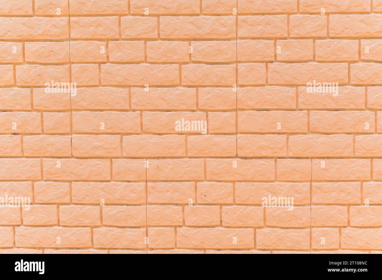 wall cladding yellow panels with brick texture Stock Photo - Alamy