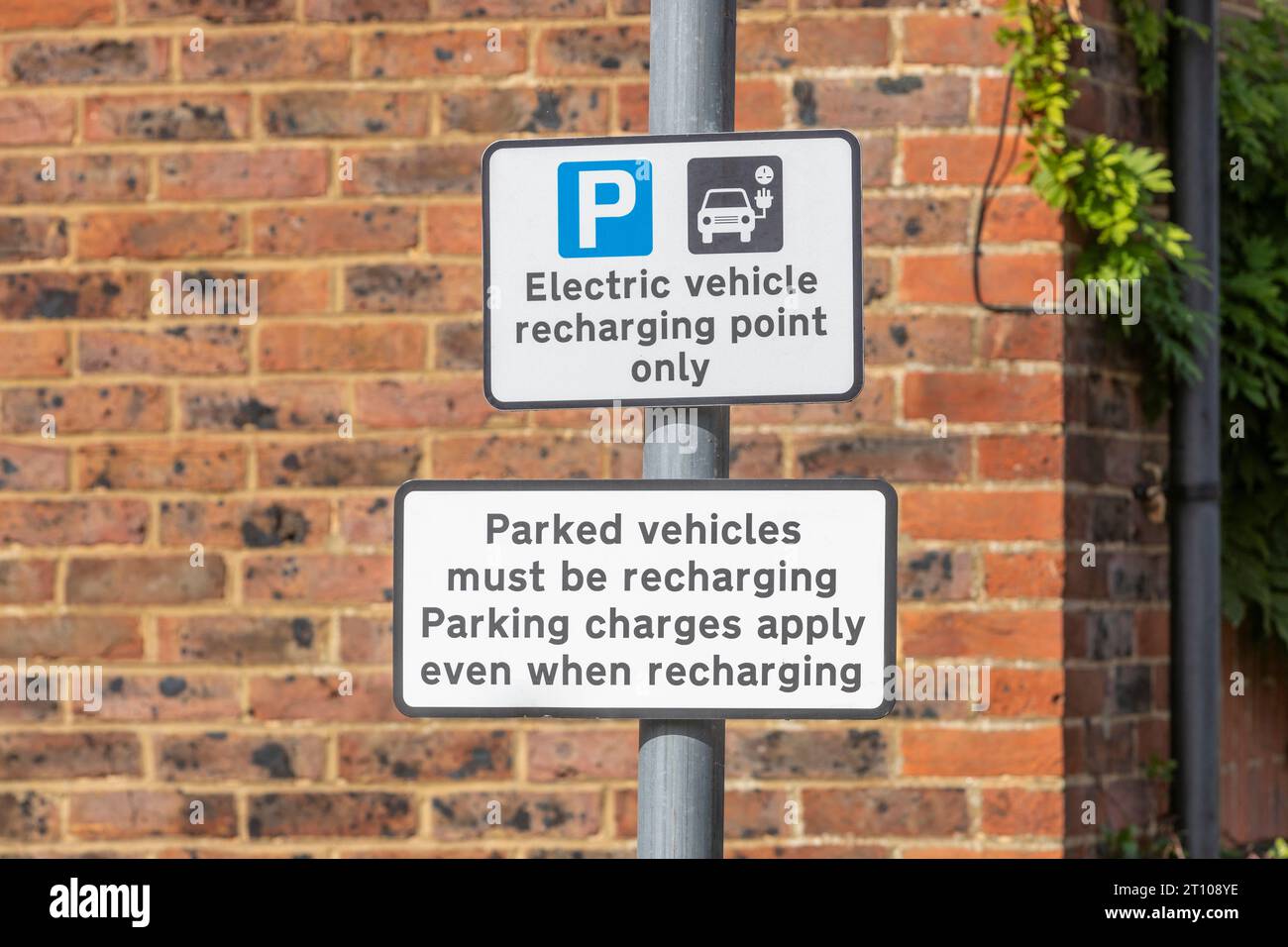 Signs for electric vehicle charging points in a car park Stock Photo ...