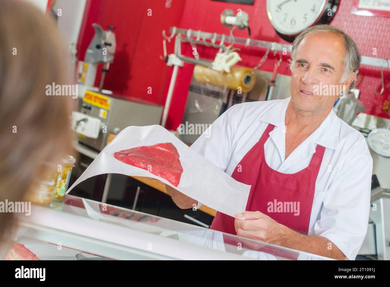 Butcher showing fresh red meat hi-res stock photography and images - Alamy