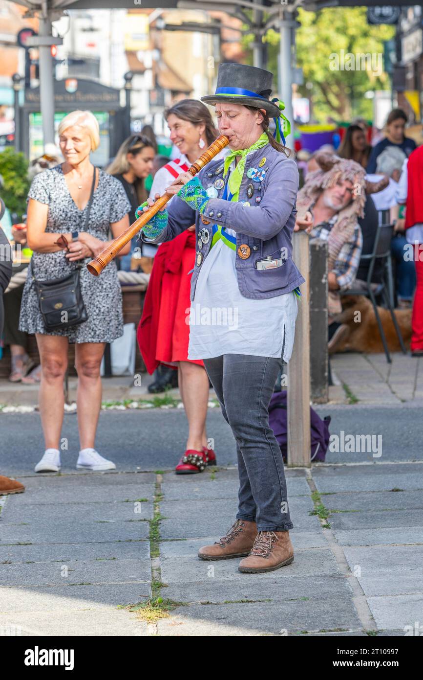 A lady pipe player at the Tenterden Folk Festival Stock Photo - Alamy