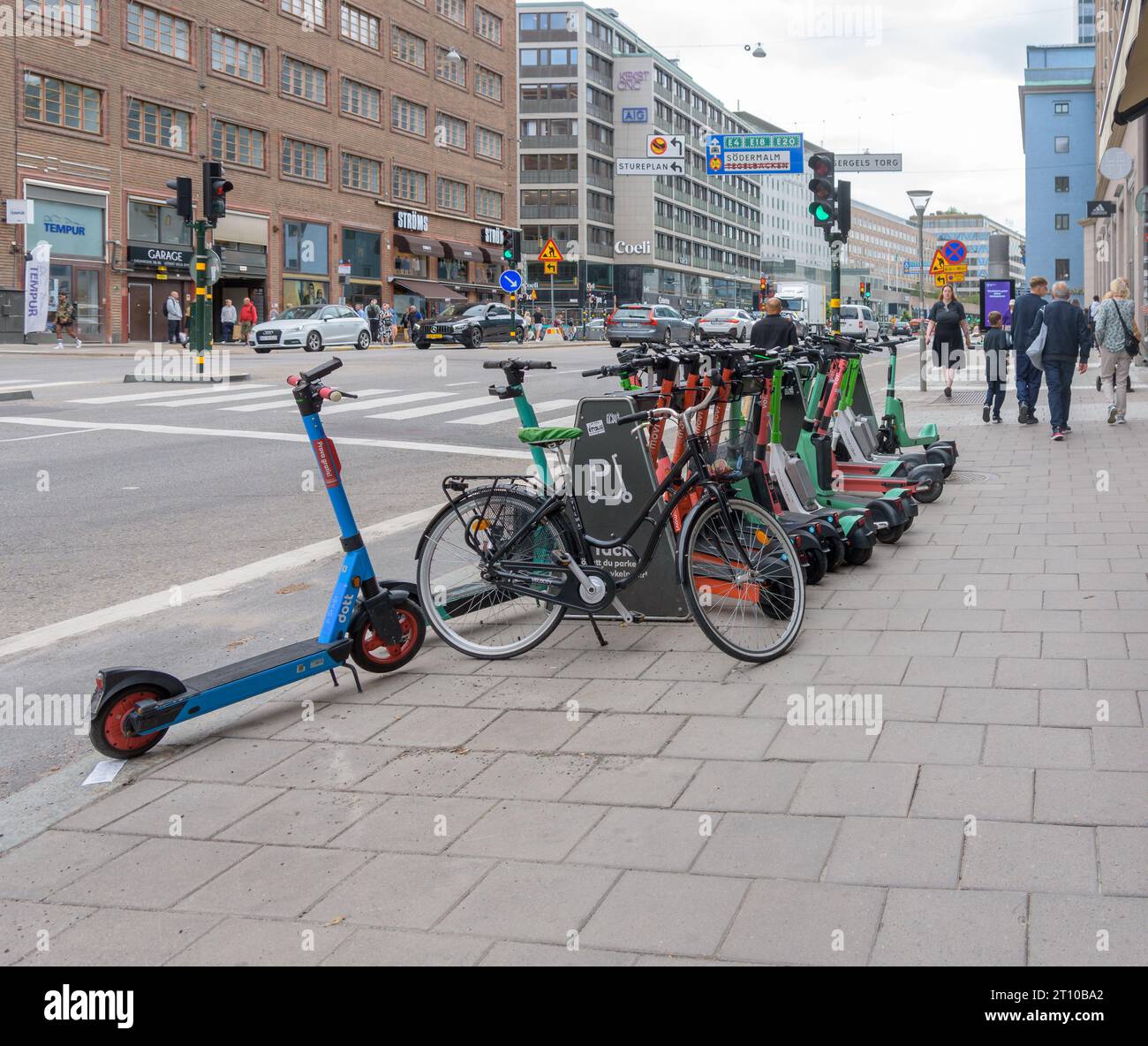 Parking space for electric scooters Stock Photo - Alamy