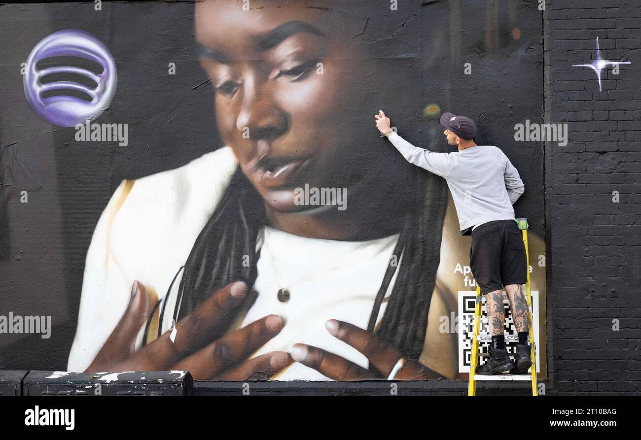 EDITORIAL USE ONLY Neil Edward, lead artist at Global Street Art. at a ...