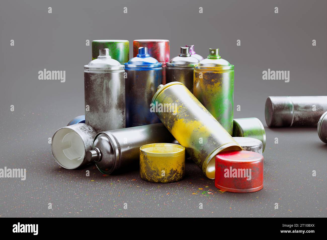Multiple colorful spray paint cans in a stack against a grey background ...