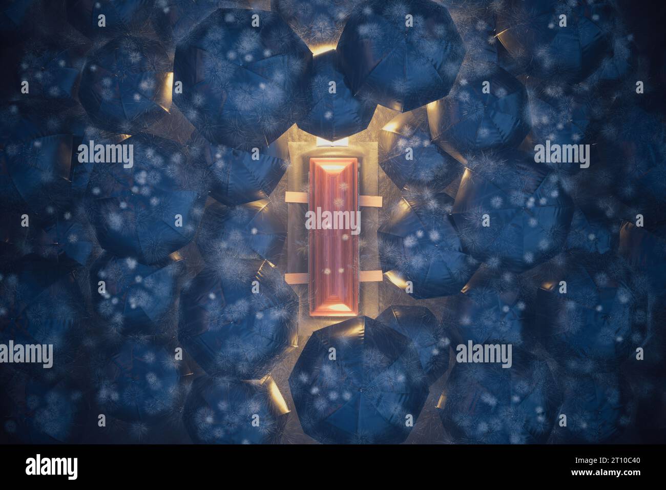 A view from above of a cemetery with a group of people standing around ...