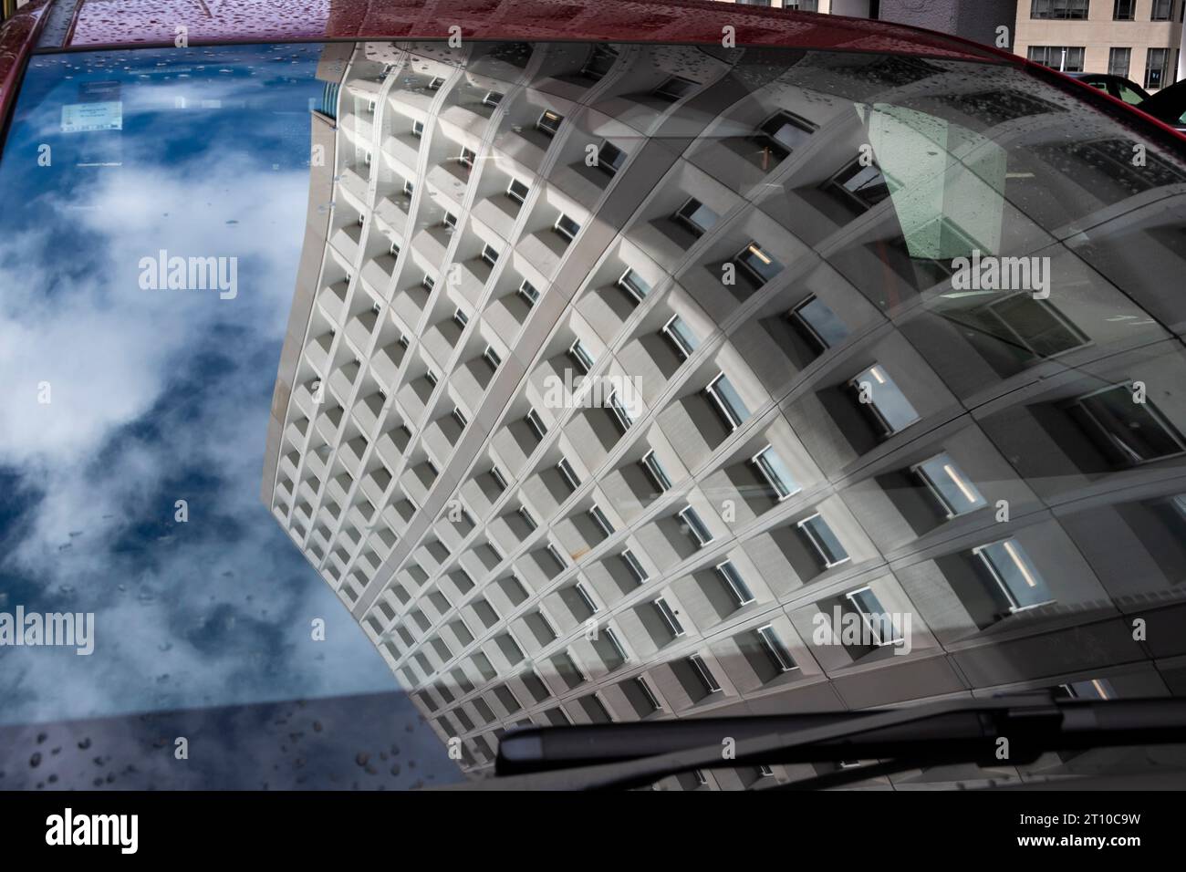 Office building reflected in car windscreen, Wellington, North Island ...
