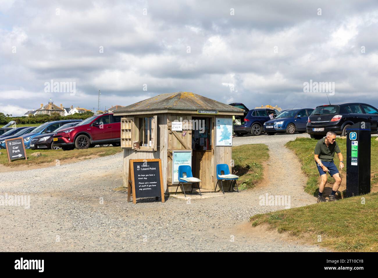 Lizard Point Cornwall car park, man using ticket machine to pay for car ...