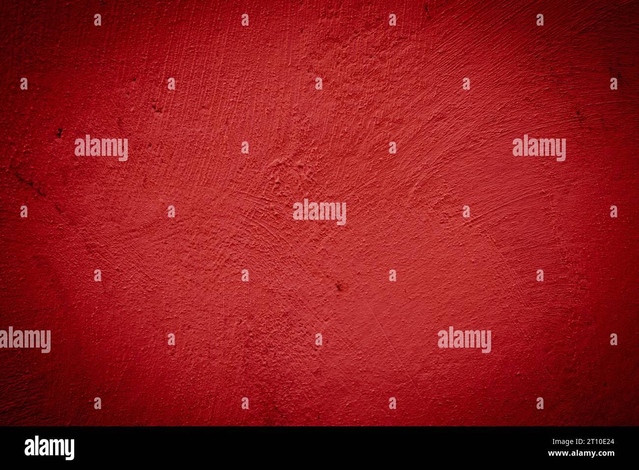 Simple wall red stone as a texture background Stock Photo - Alamy