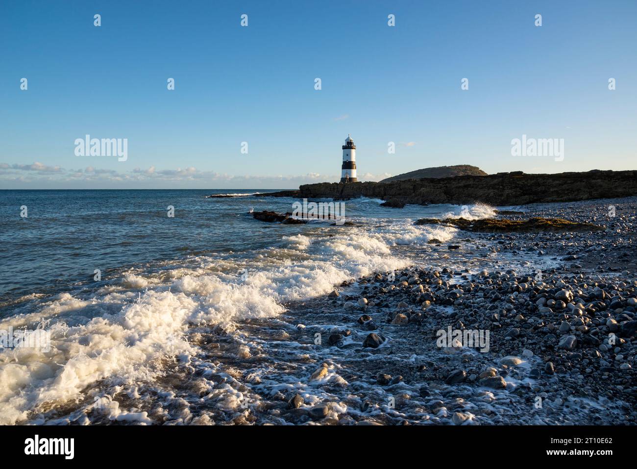 Penmon Point on the coast of Anglesey, North Wales. Trwyn Du Lighthouse ...