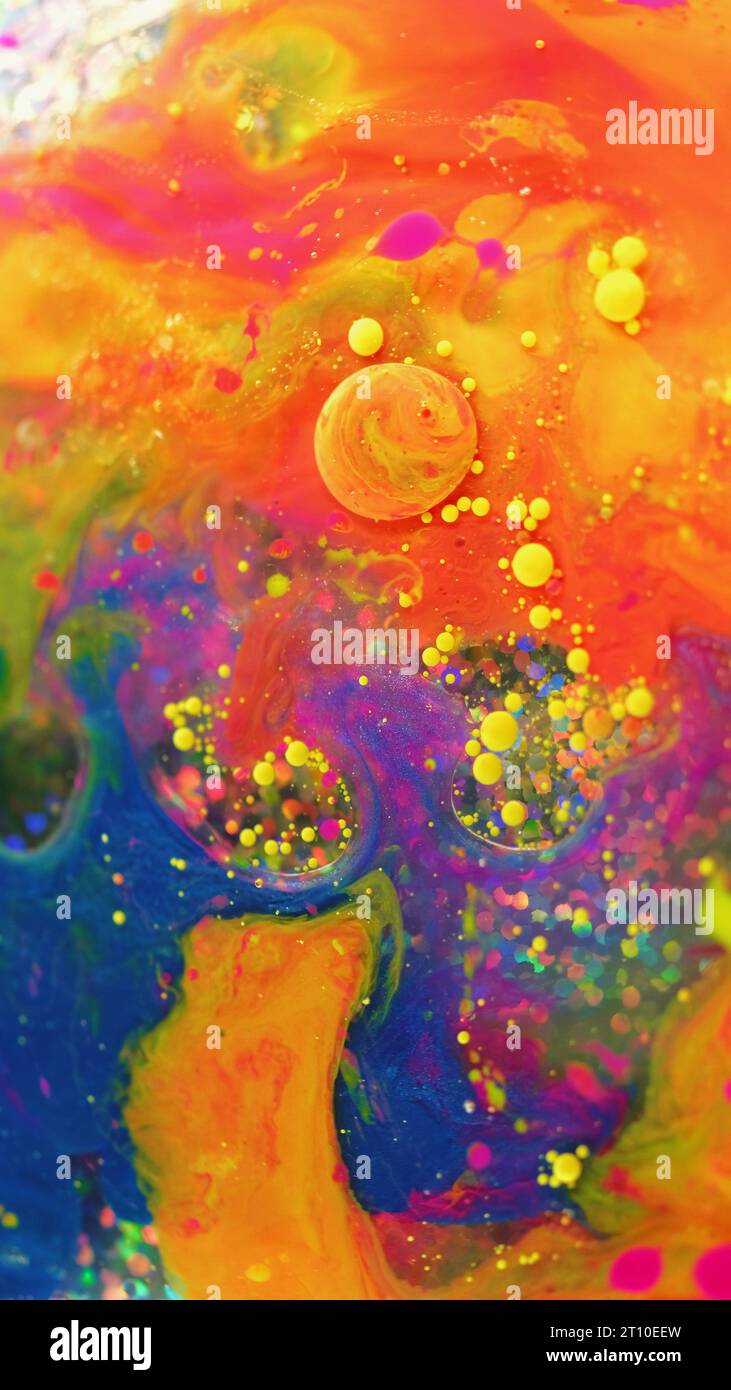 Liquid paint background color bubbles glitter Stock Photo - Alamy