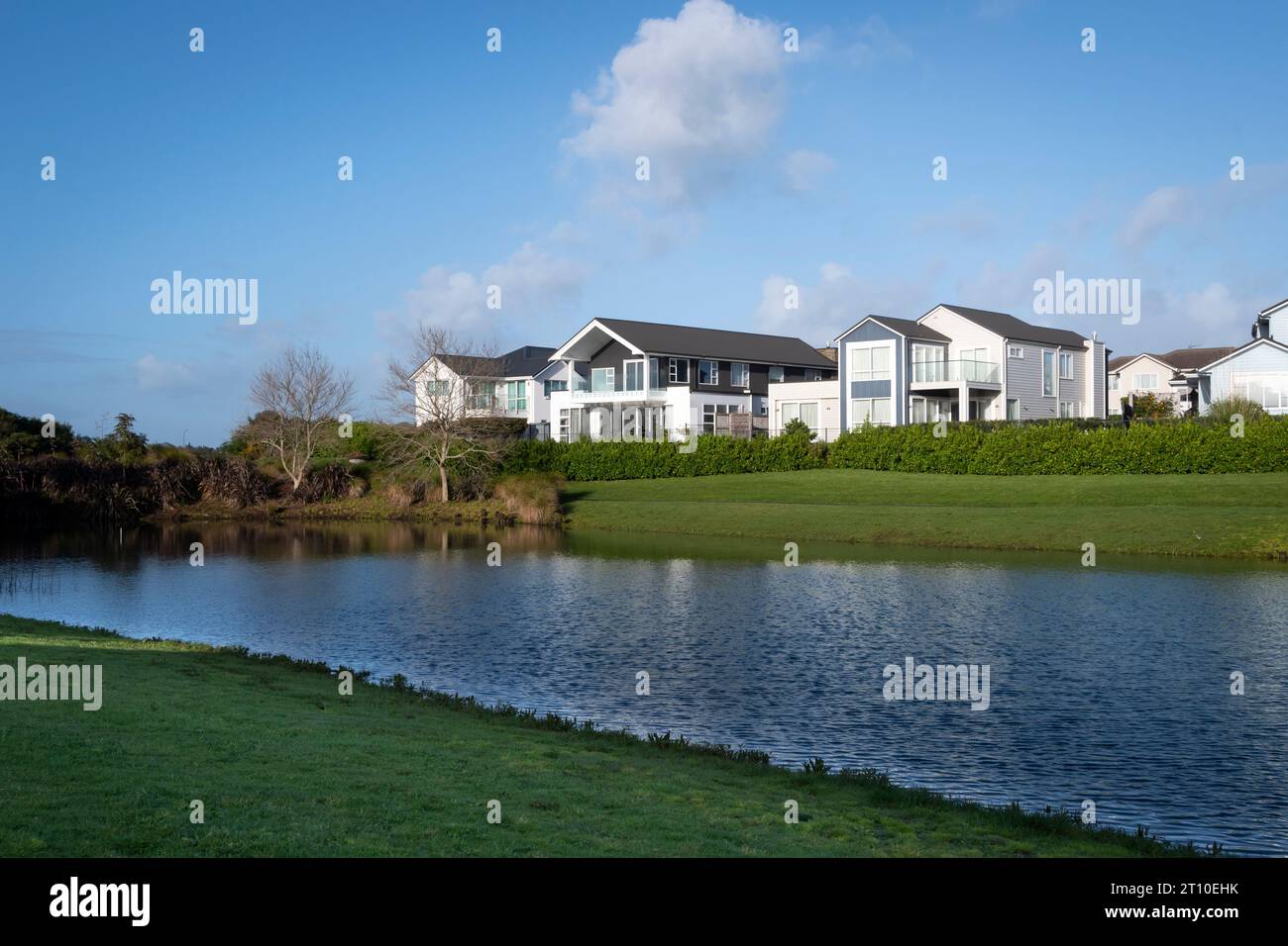 Lakeside houses in modern suburb, Karaka, Auckland, North Island, New ...