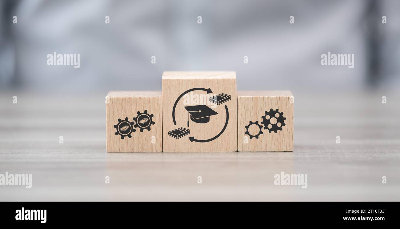 Wooden blocks with symbol of continuing education concept Stock Photo ...