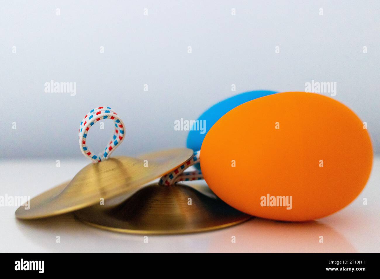 Mini percussion instruments (eggs and finger cymbals Stock Photo - Alamy