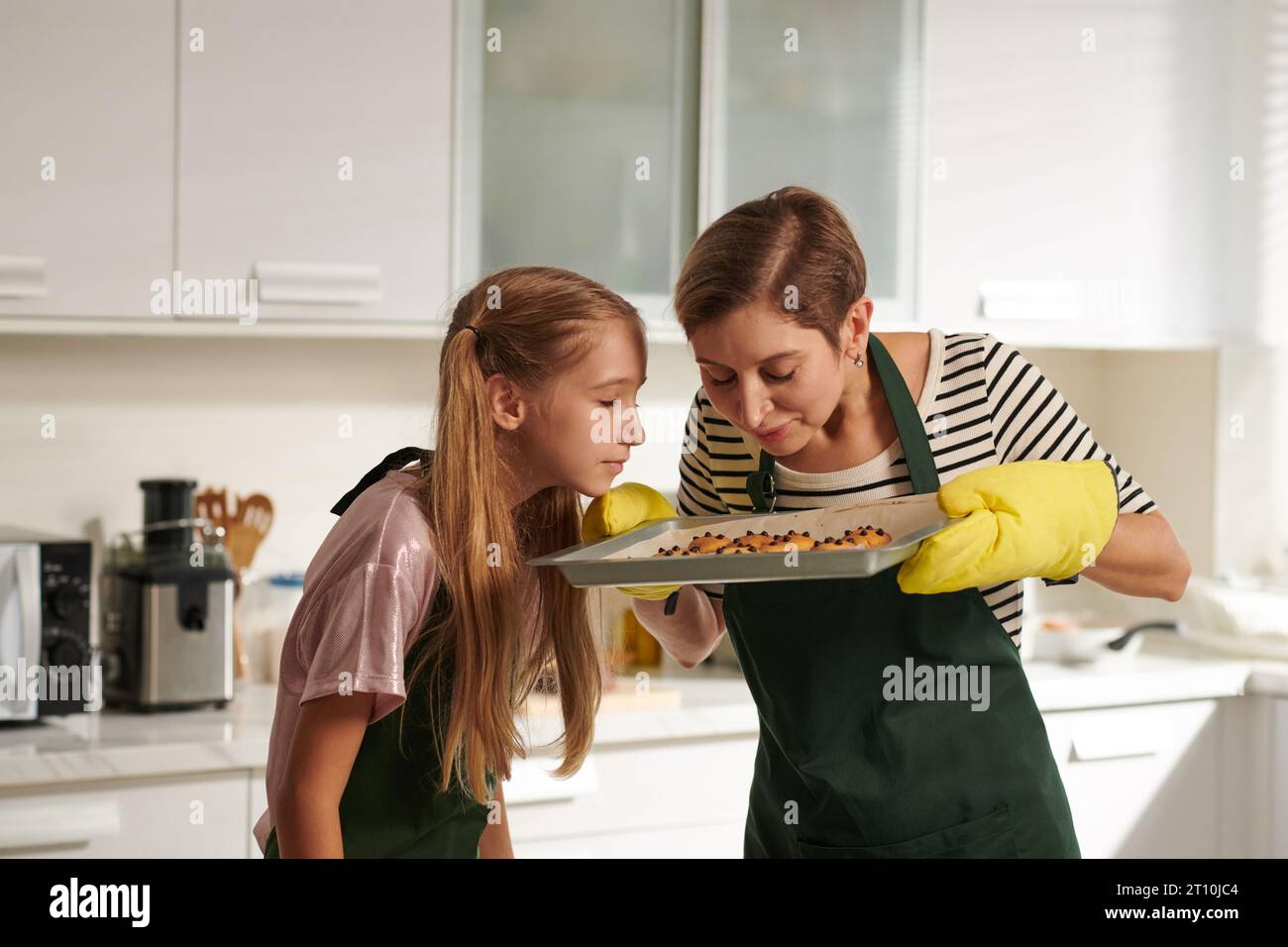 Child enjoying smell of cooking hi-res stock photography and images - Alamy