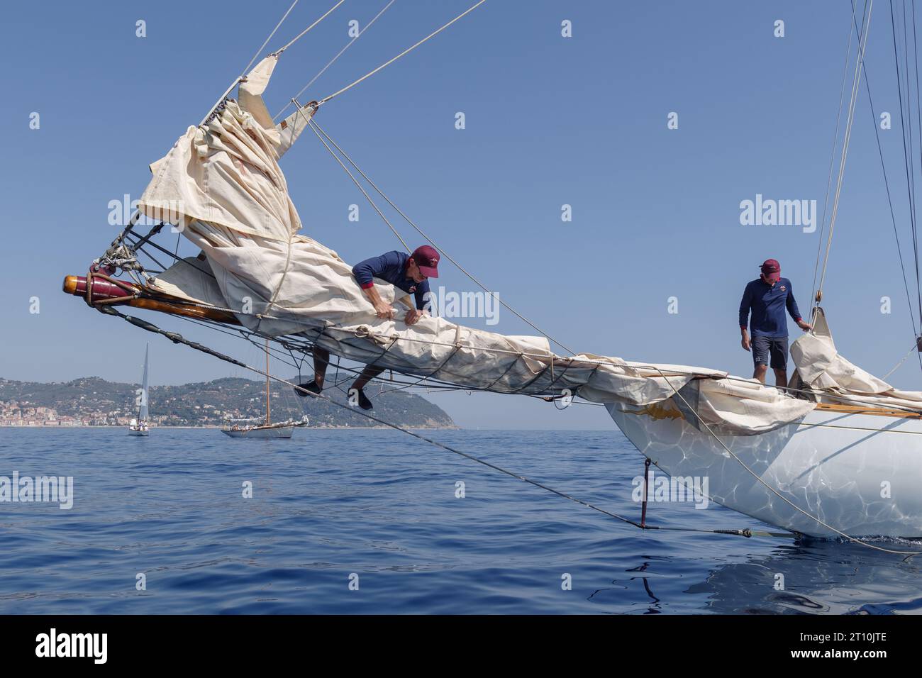 Crew members aboard on sailboat Tuiga, flagship of the Monaco Yacht ...
