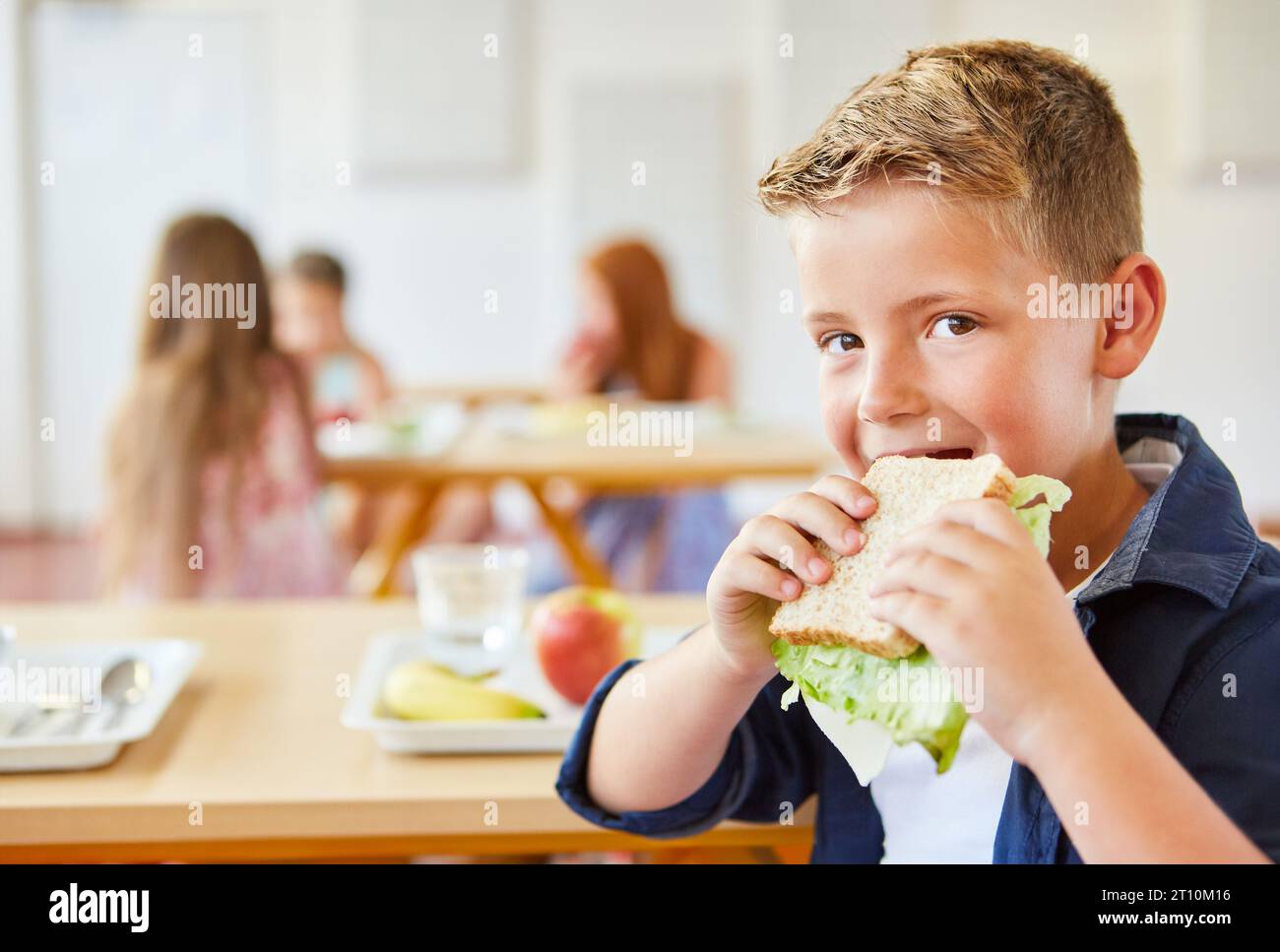 Eating sandwich during school hi-res stock photography and images - Alamy
