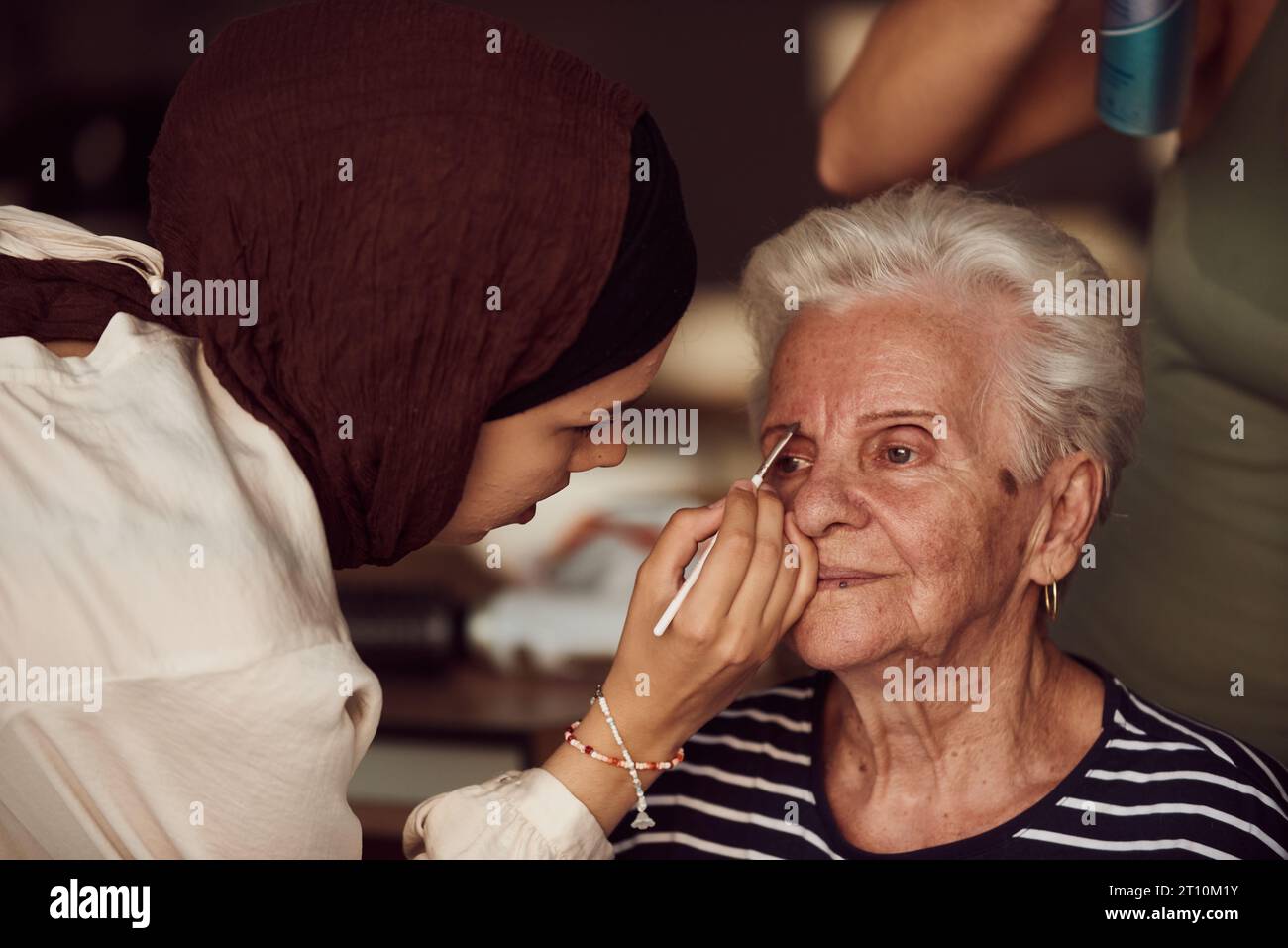 In this heartwarming real-life scene, a girl in a hijab and her sister ...