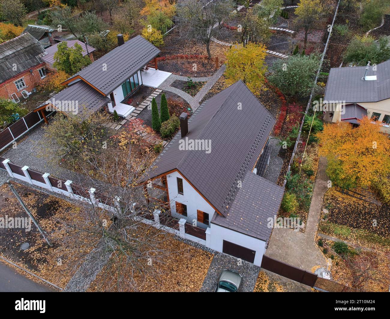 modern country house in the village in autumn top view Stock Photo - Alamy