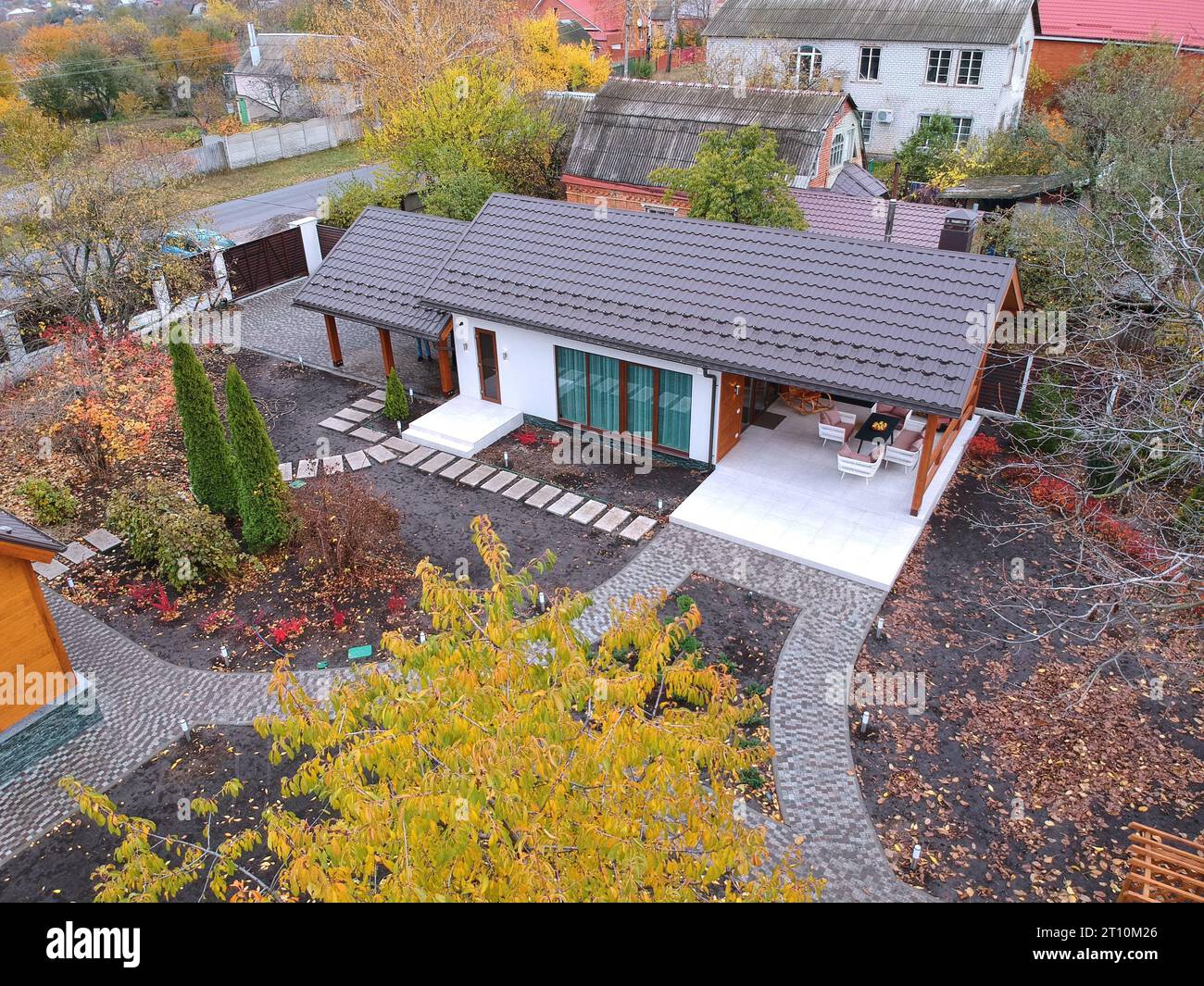 modern country house in the village in autumn top view Stock Photo - Alamy