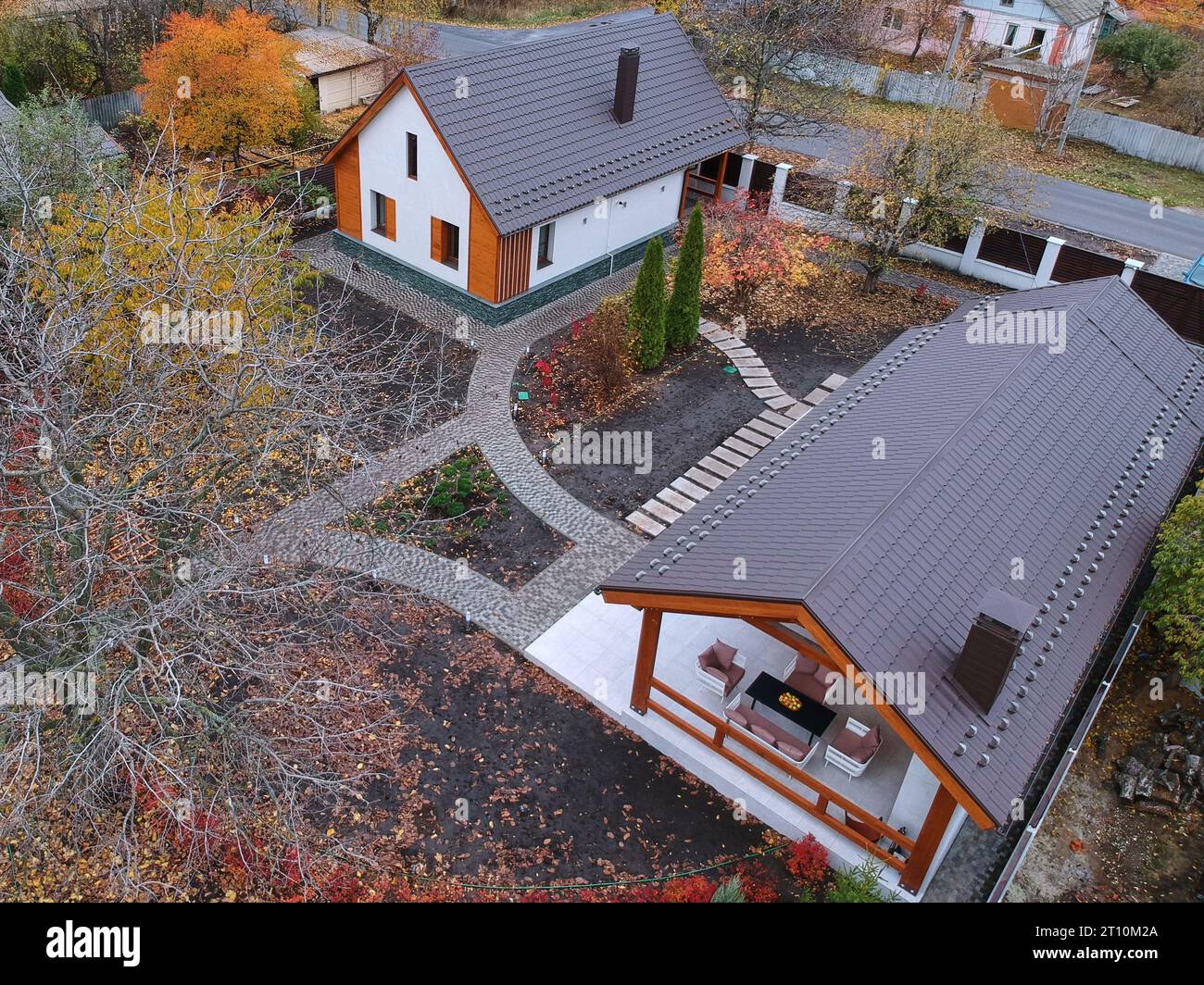 modern country house in the village in autumn top view Stock Photo - Alamy