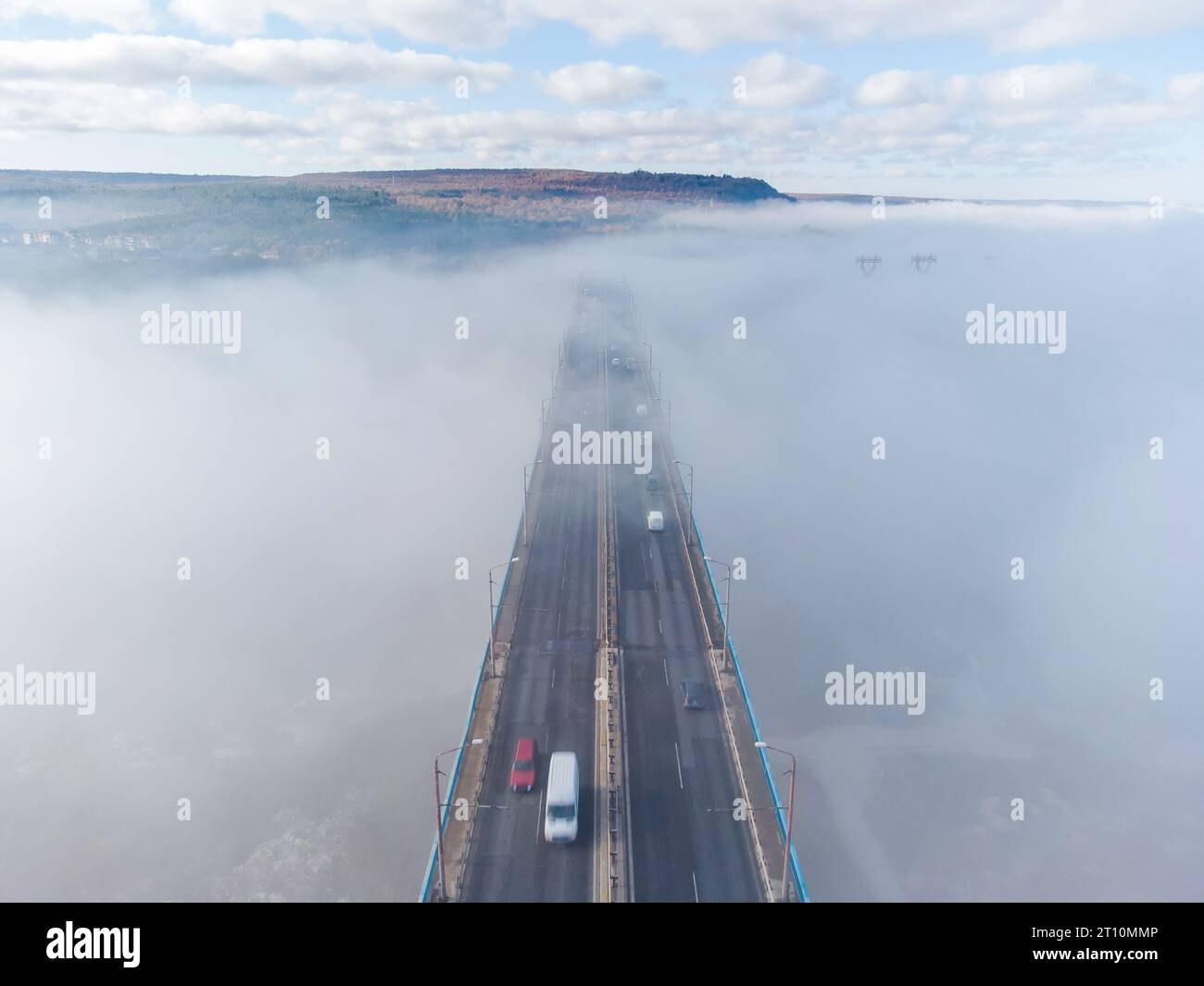 Aerial top view of the Asparuhov bridge in the fog in the morning ...