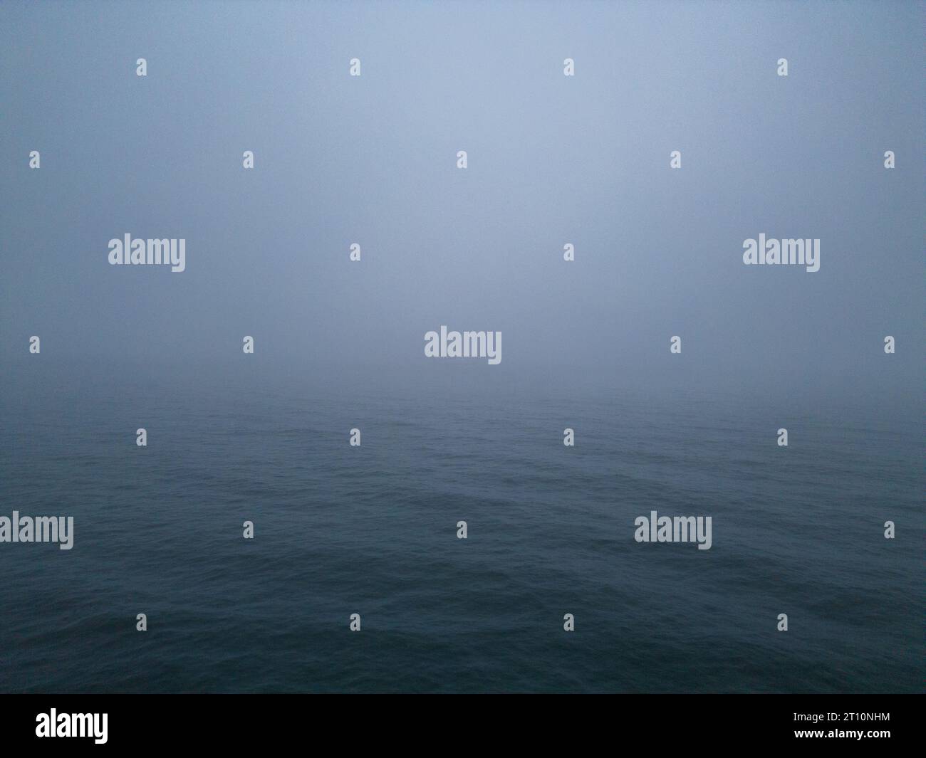 atmosphere of a sea at night and fog. The combination of the dark ...