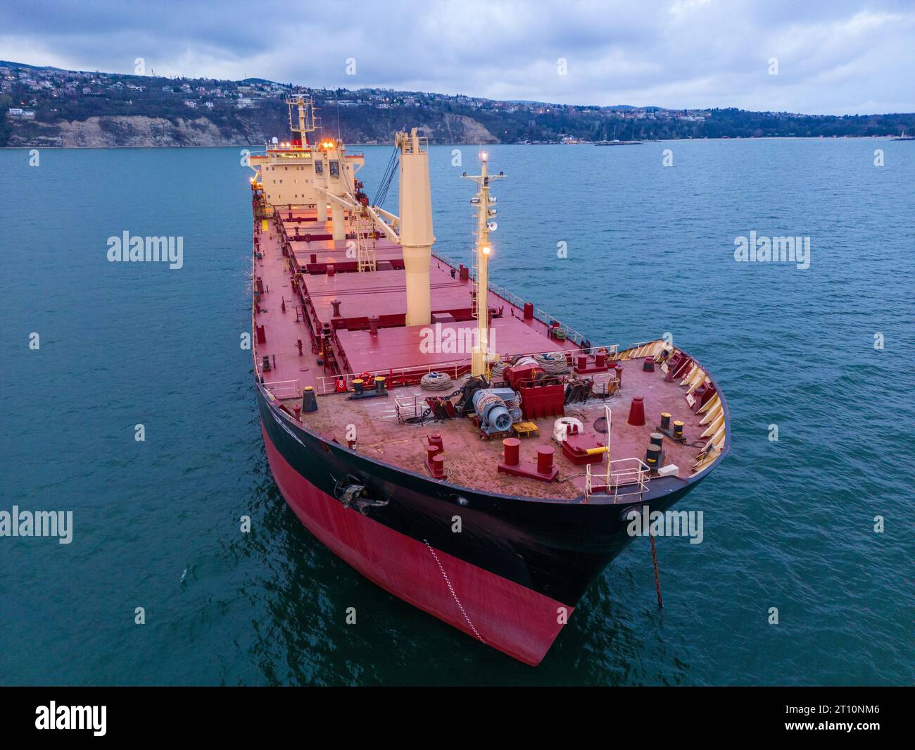 aerial view of a bulk carrier at evening showcases a stunning display ...