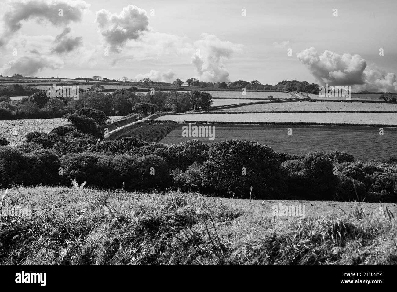 COUNTRY ROAD PLOUGHED FIELDS CORNISH HEDGES TRACTOR Stock Photo - Alamy