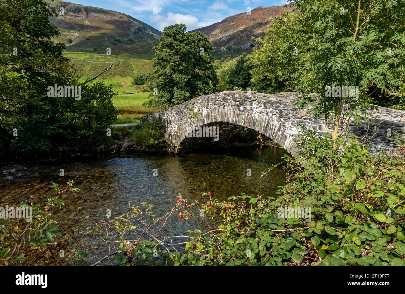 New Bridge across River Derwent on the Cumbria Way in summer Rosthwaite ...