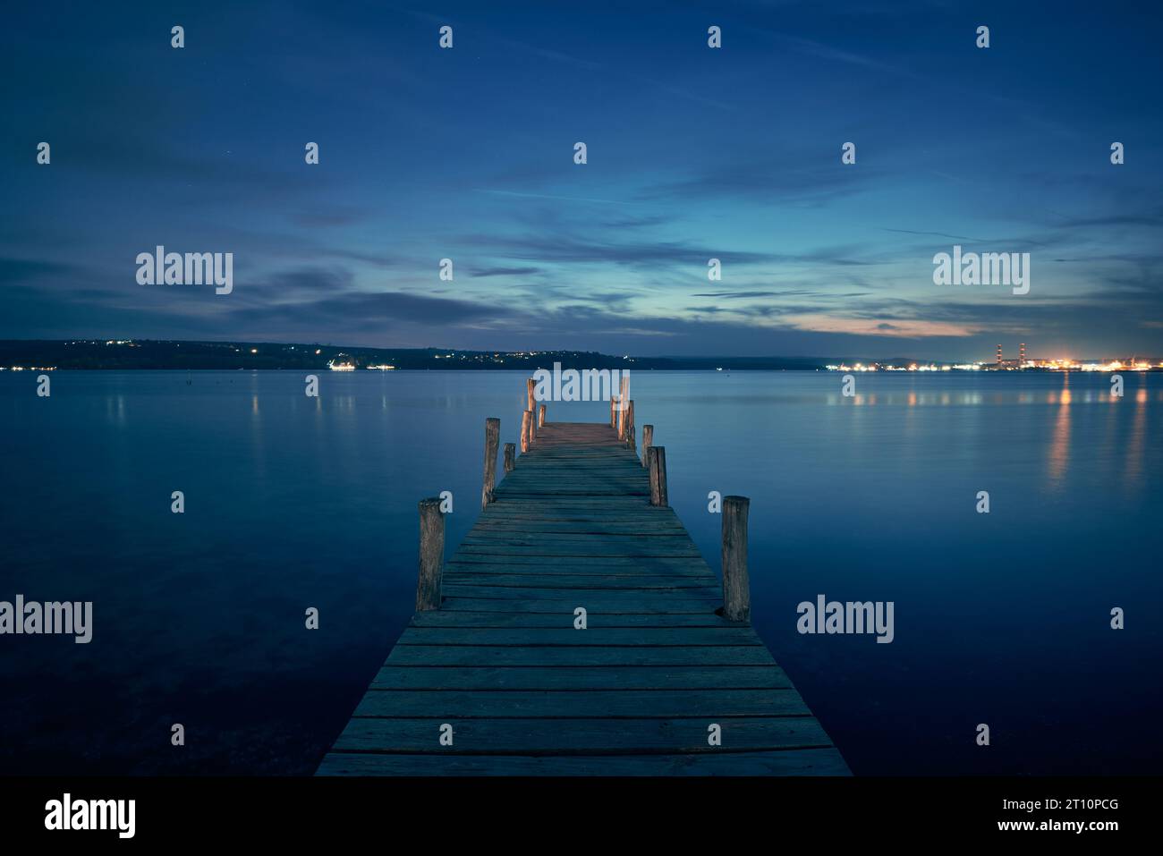 Landscape photo of a wooden jetty on lake at night in Varna, Bulgaria ...